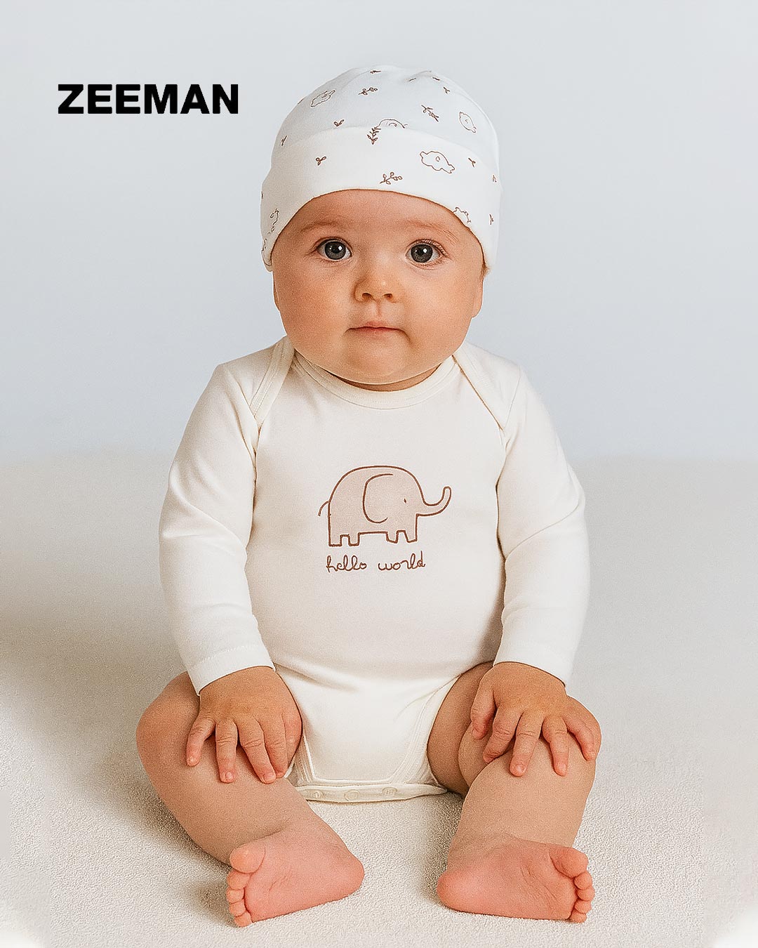 ZEEMAN OFF WHITE HELLO WORLD ELE ROMPER WITH CAP – PEEKABOO.PK